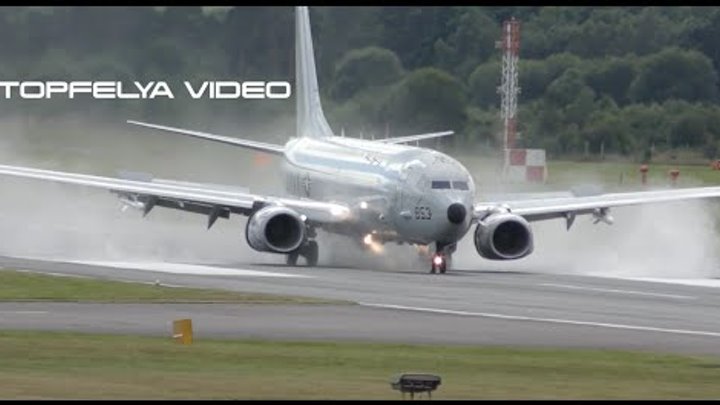 Steep Bank to final and powerful reverse thrust spray Boeing P-8 ...